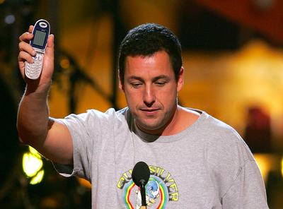 Adam Sandler Holding Flip Phone - Cell Phone News & More - Wing Blog